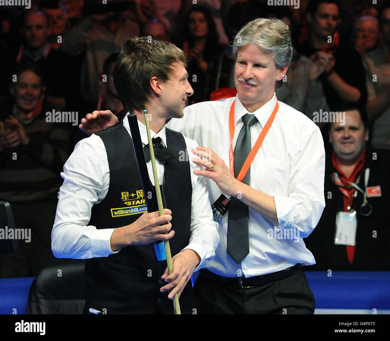 England's Judd Trump celebrates with his father Steve after winning the ...