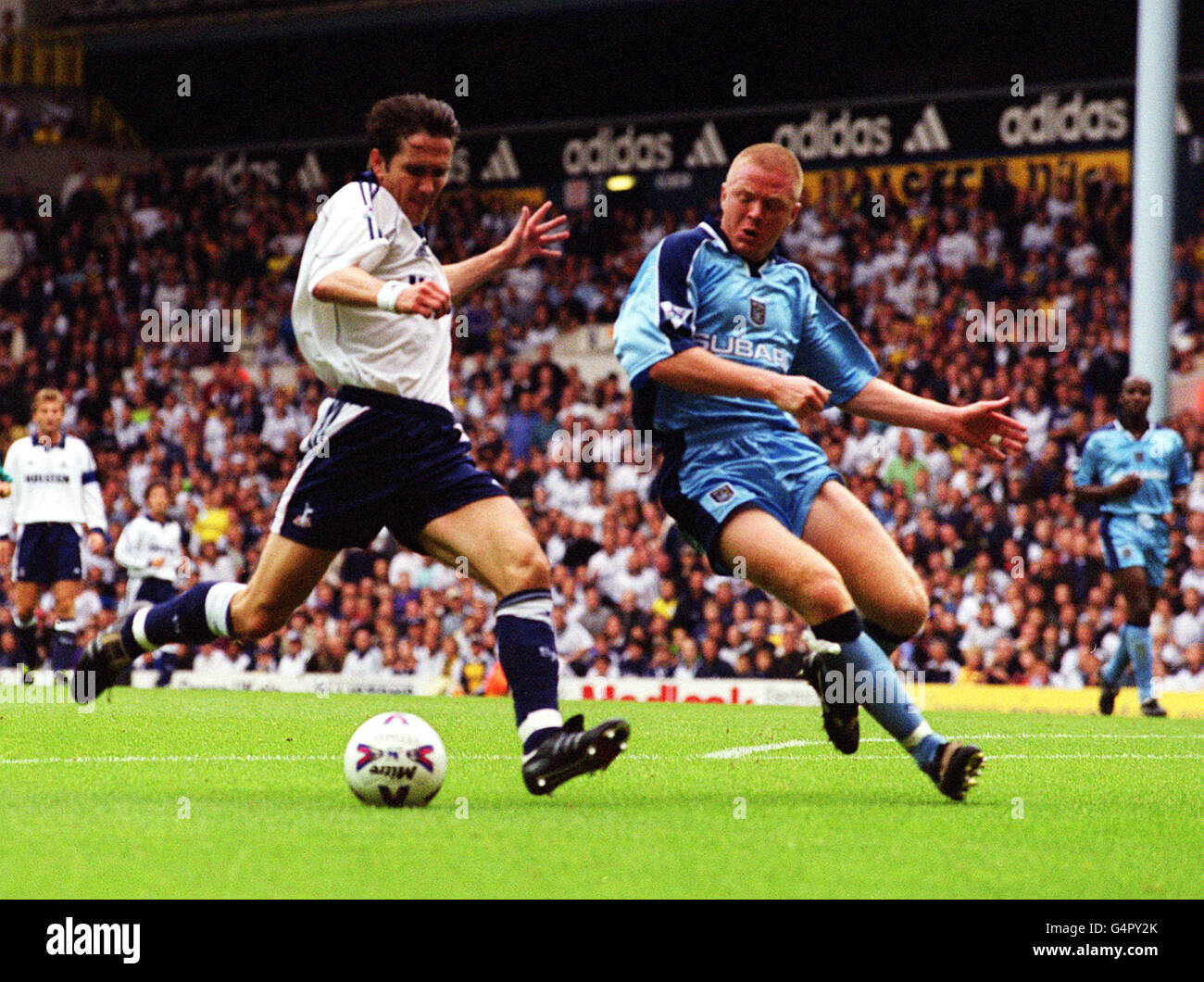 Tottenham Hotspurs' Oyvind Leonhardsen battles with Coventry City's ...