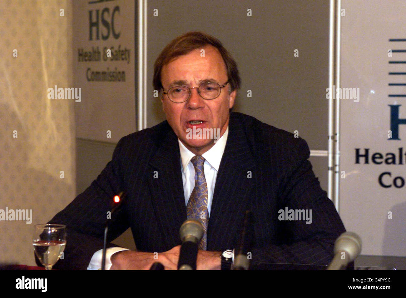 Professor John Uff explains train safety equipment during a press ...