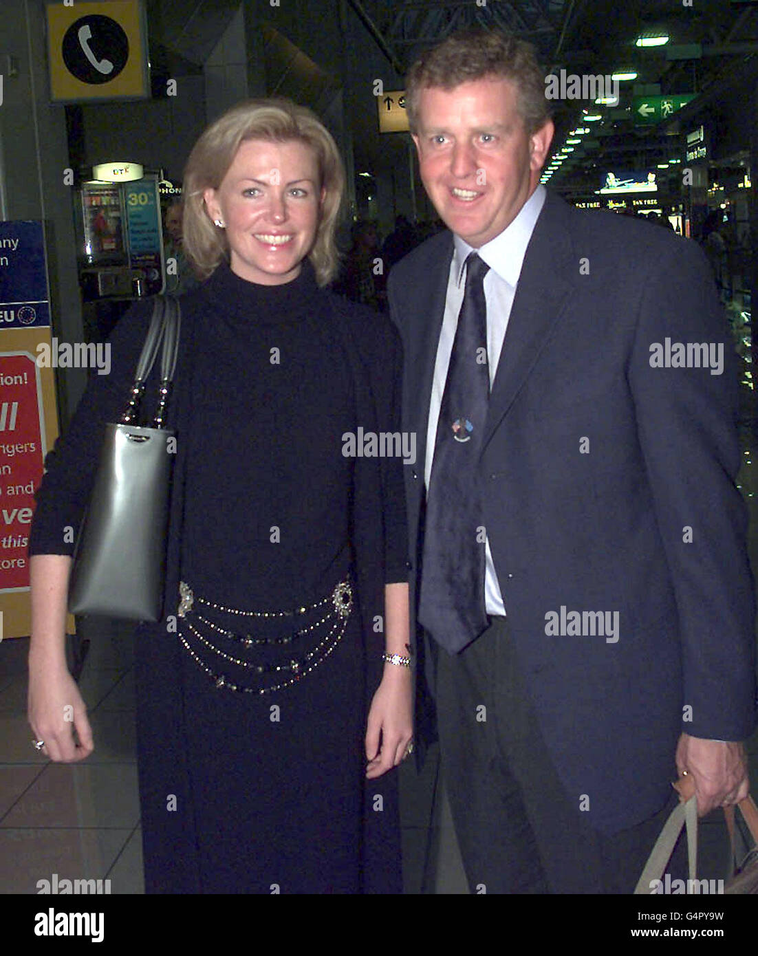 Colin Montgomerie with his wife Elmear at Heathrow Airport before ...