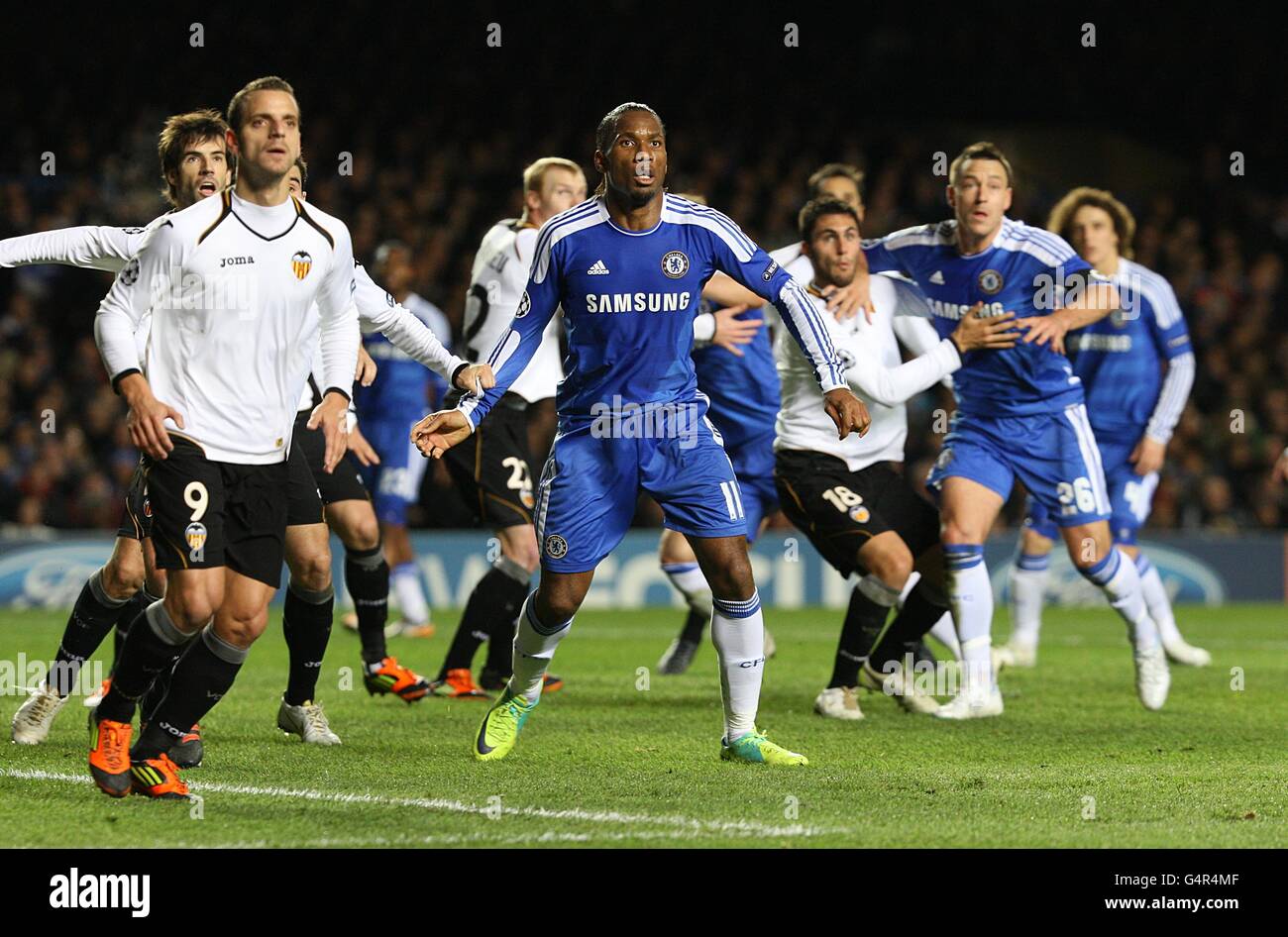 Chelsea and Valencia players compete for space in the area Stock Photo ...