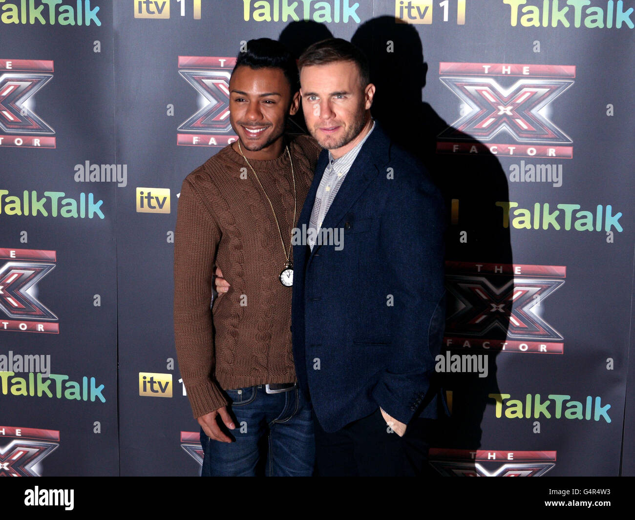 X Factor finalist Marcus Collins poses with his mentor Gary Barlow ...