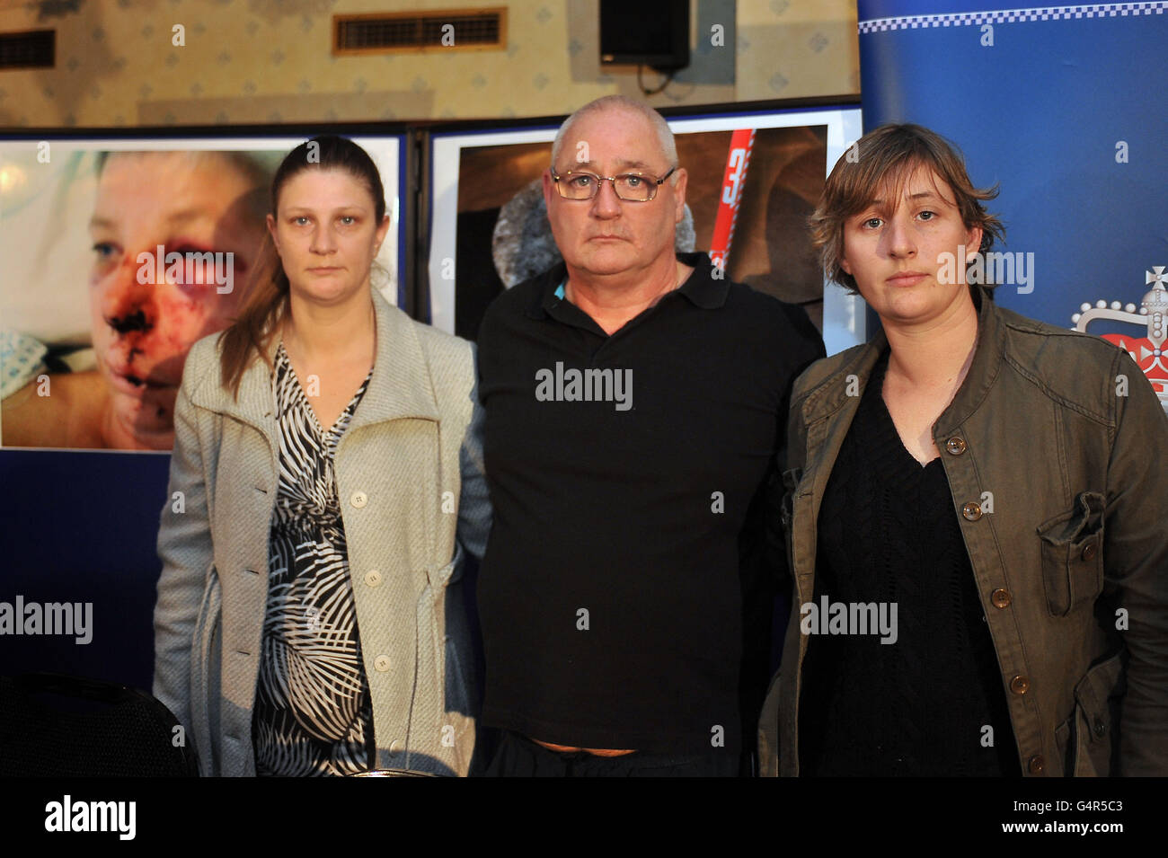 Steve Manley, with daughters Michelle, (left), and Sarah, attend a ...