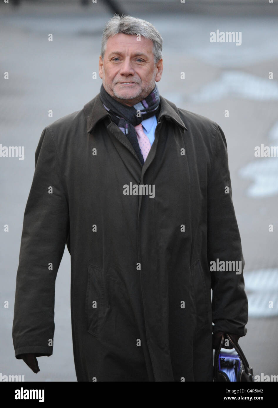 Former Executive Editor of the News of the World Neil Wallis arrives at ...