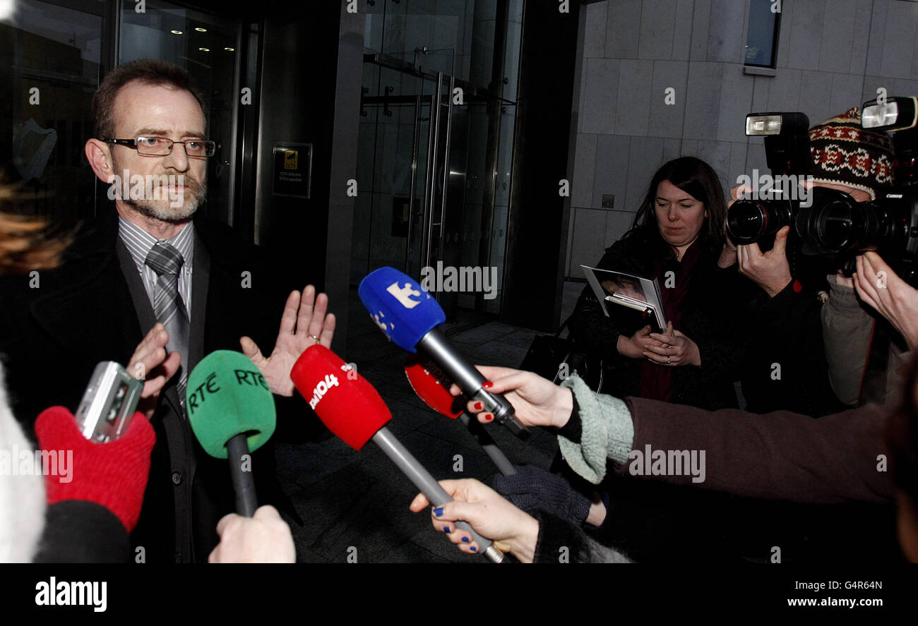 Brendan Davis the father of 12 year old Michaela Davis, hands out a ...