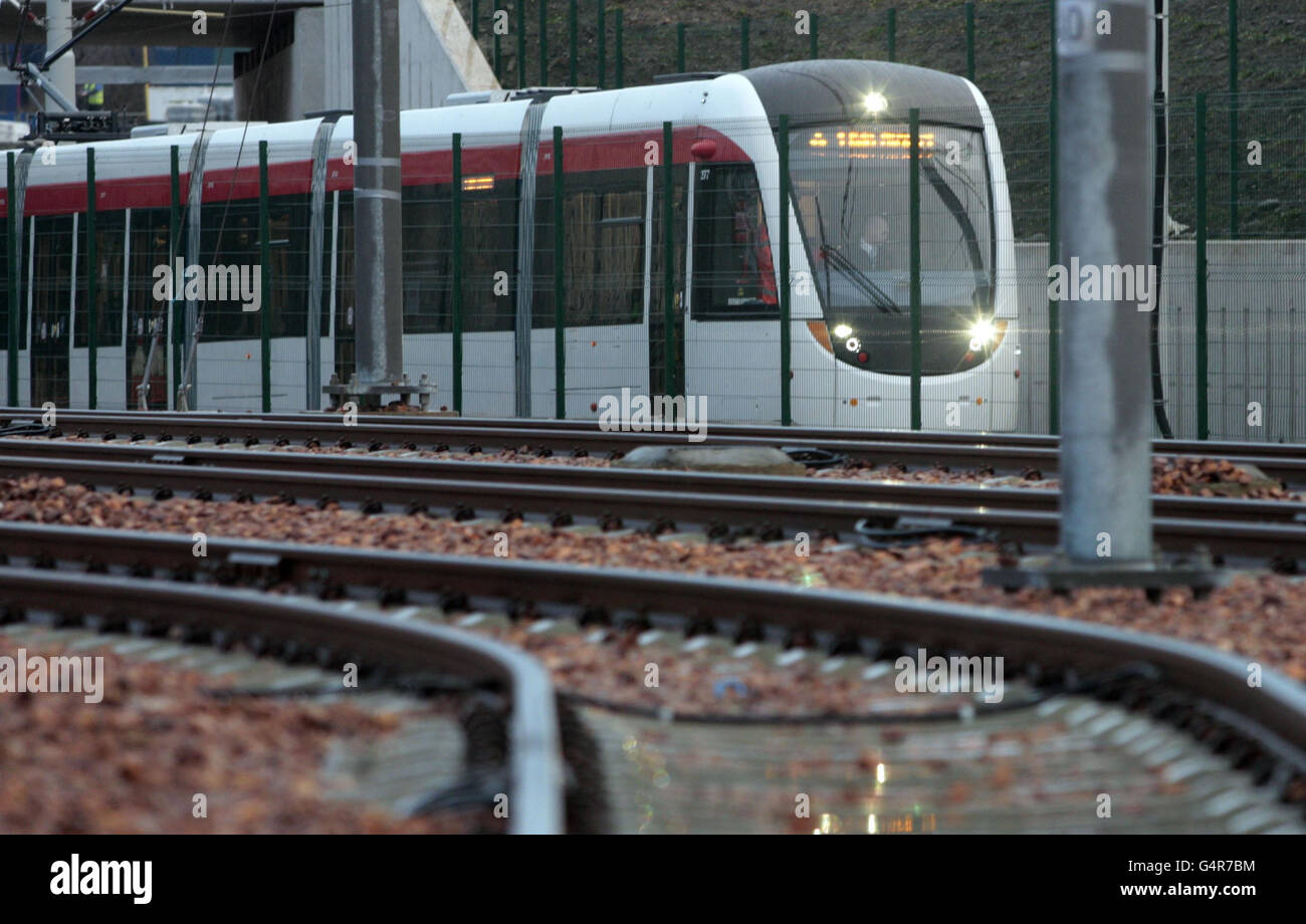 A tram moves along the track during the official handover of the Gogar ...