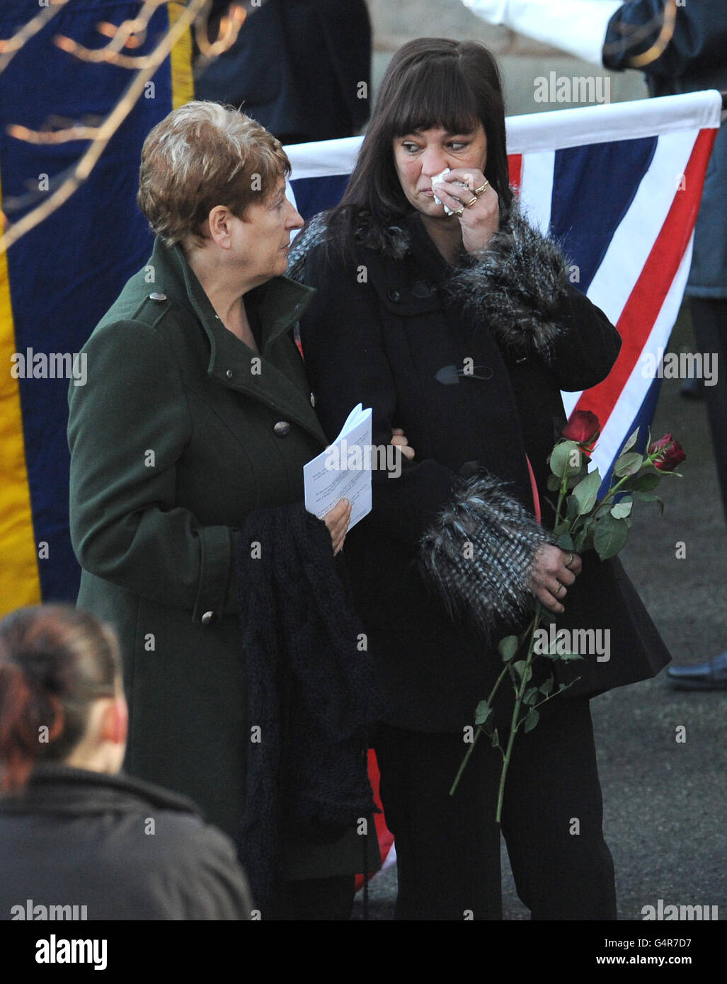 The coffin of Rifleman Sheldon Steel is followed by his family led by ...