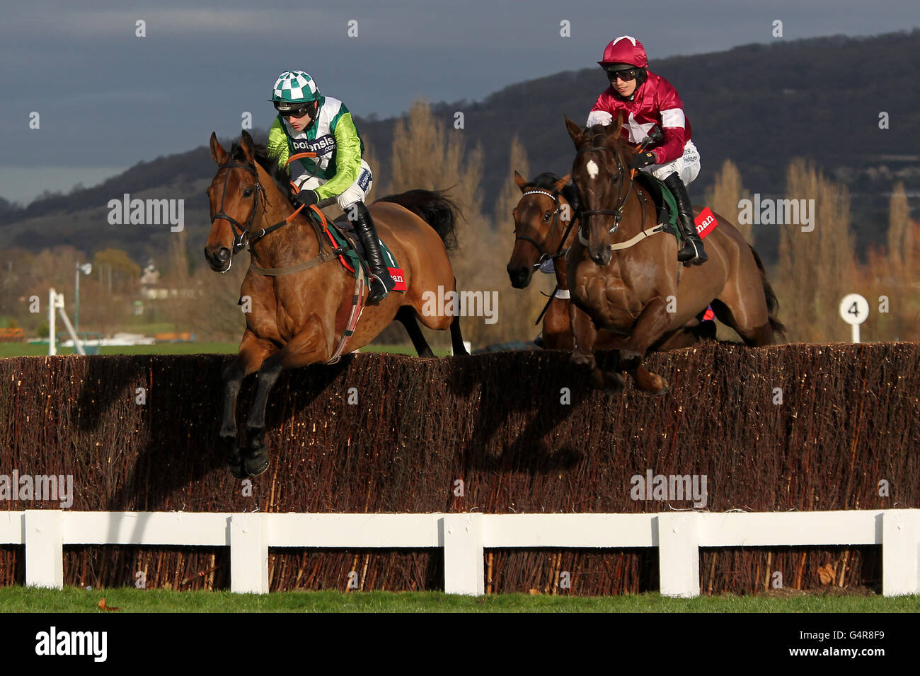 Join Together (left) ridden by Jockey Ruby Walsh jumps ahead of Fists ...