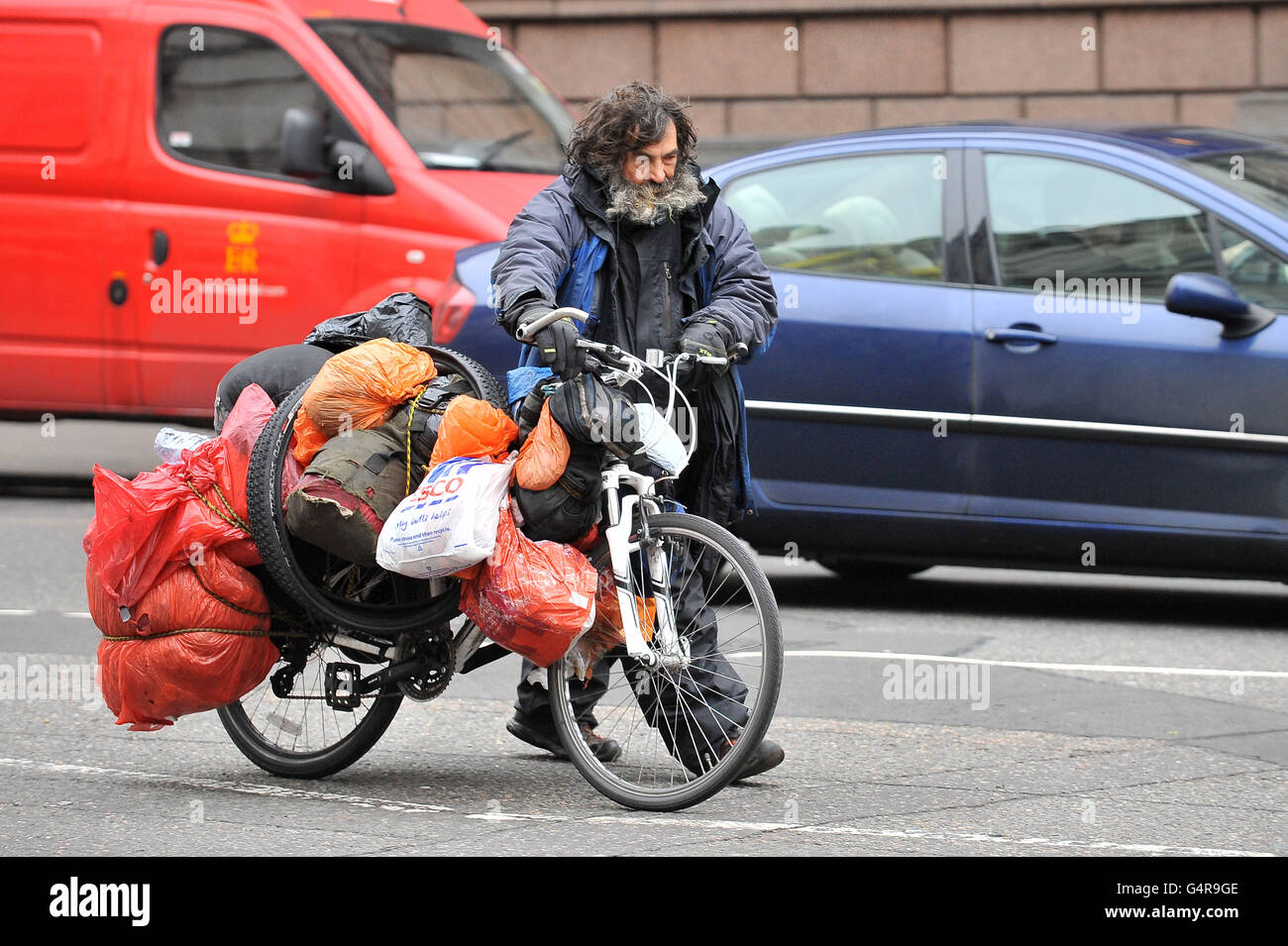 Man with bike Stock Photo - Alamy