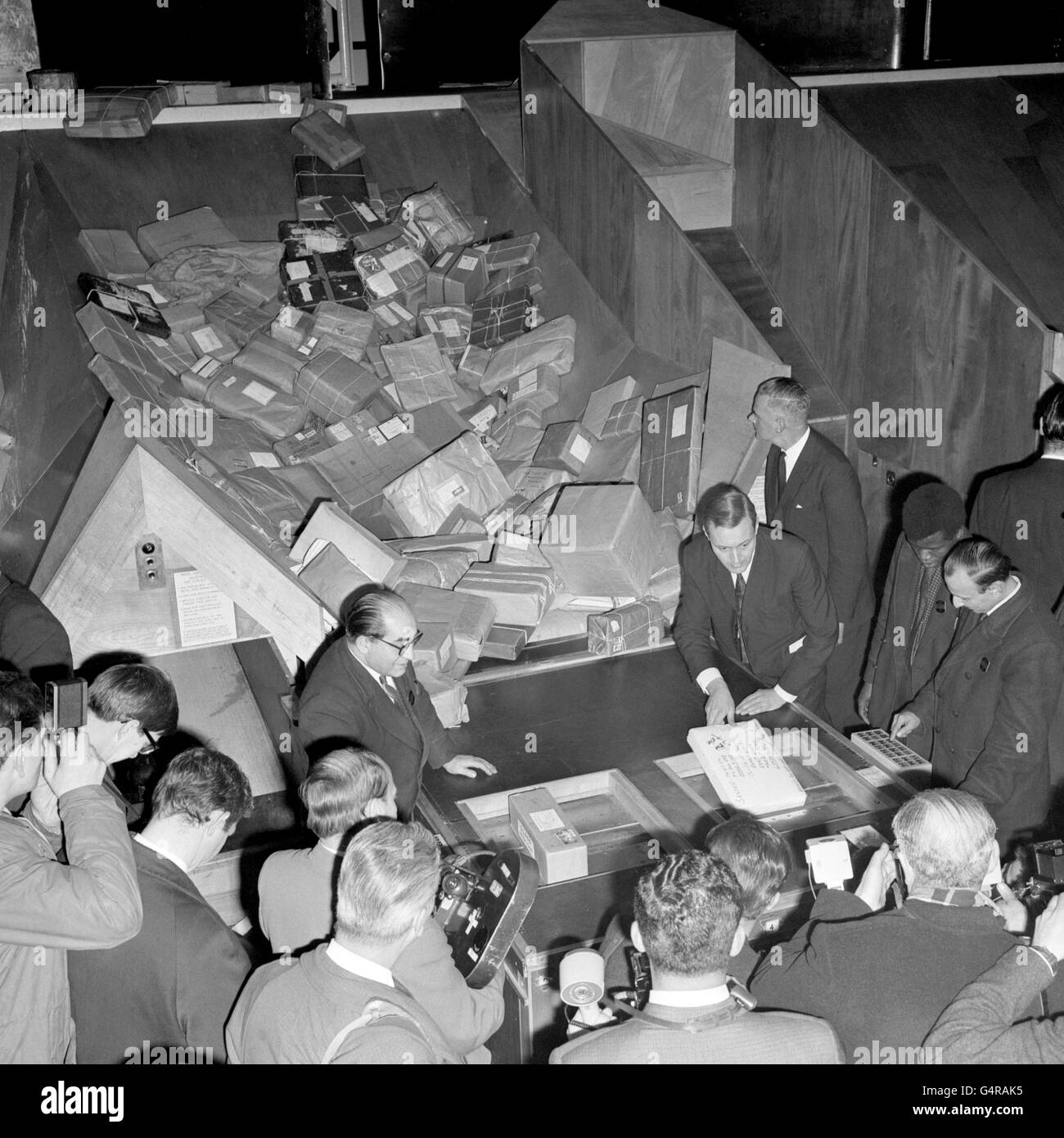 Postmaster General Tony Benn (right) during a visit to the new Western ...