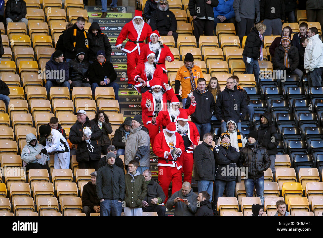 Wolverhampton Wanderers fans dressed as Father Christmas make their way ...