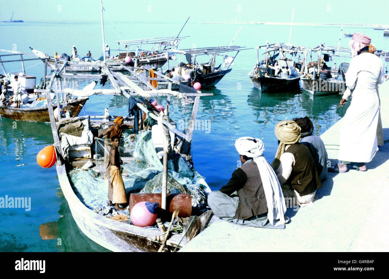 Dhow fisherman in Abu Dhabi, United Arab Emirates Stock Photo - Alamy