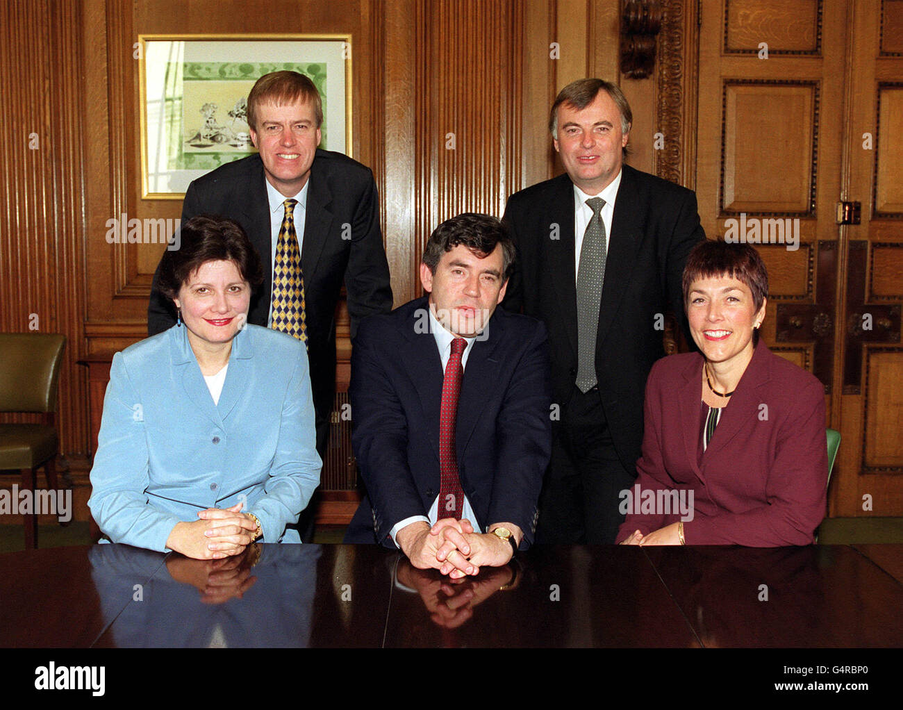 Chancellor gordon brown centre flanked by his new treasury team hi-res ...