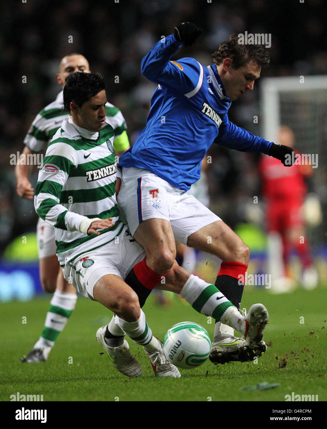 Rangers' Nikica Jelavic and Celtic's Beram Kayal (left) in action ...