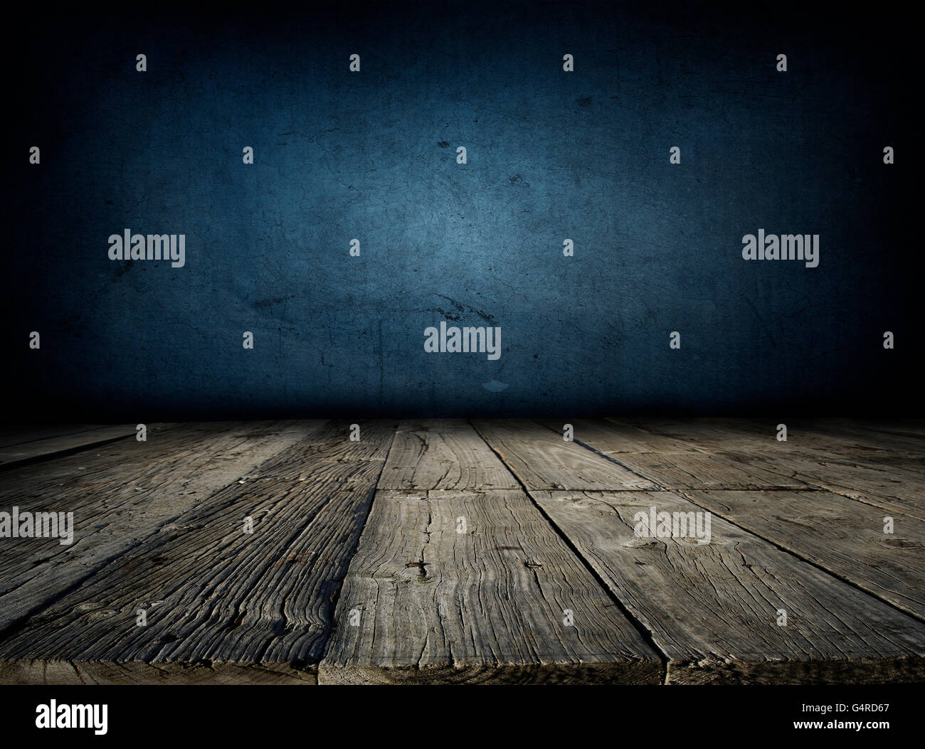 Wooden floorboards and blue wall Stock Photo - Alamy