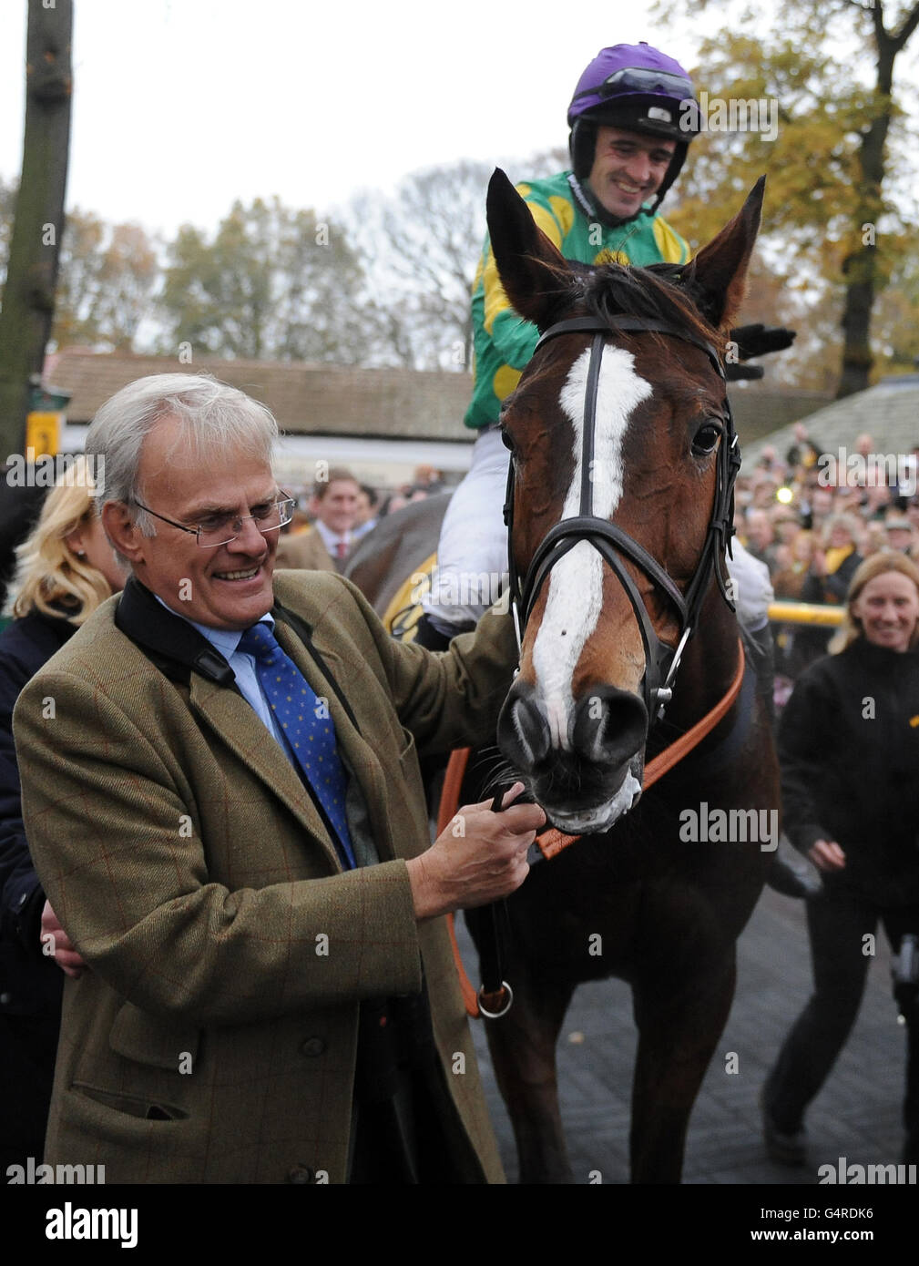 Kauto Star owner Clive Smith and jockey Ruby Walsh celebrate after ...