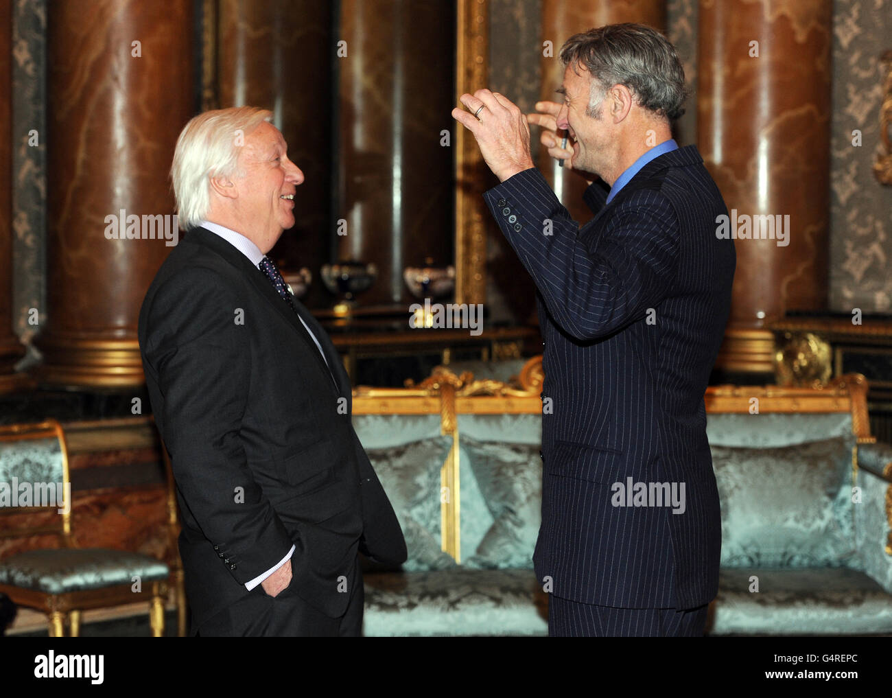 Royal cameraman Peter Wilkinson speaks with Sir Ranaulph Fiennes as the ...