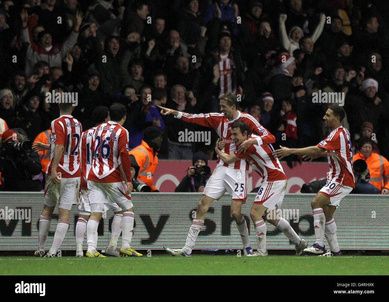 Stoke citys peter crouch centre celebrates after scoring their goal hi ...