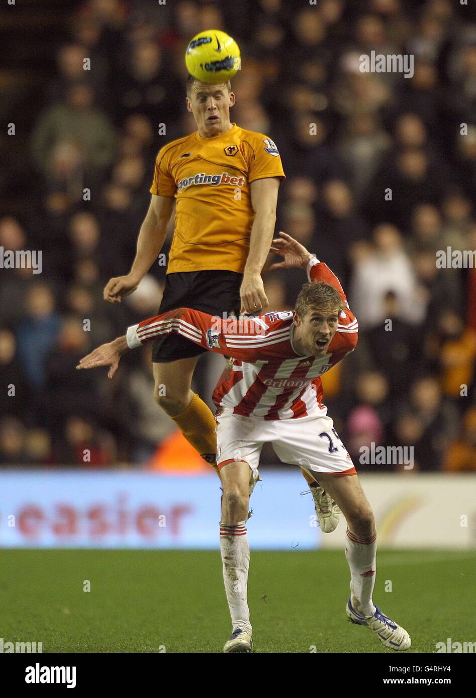 Wolverhampton Wanderers' Christophe Berra (left) and Stoke City's Peter ...