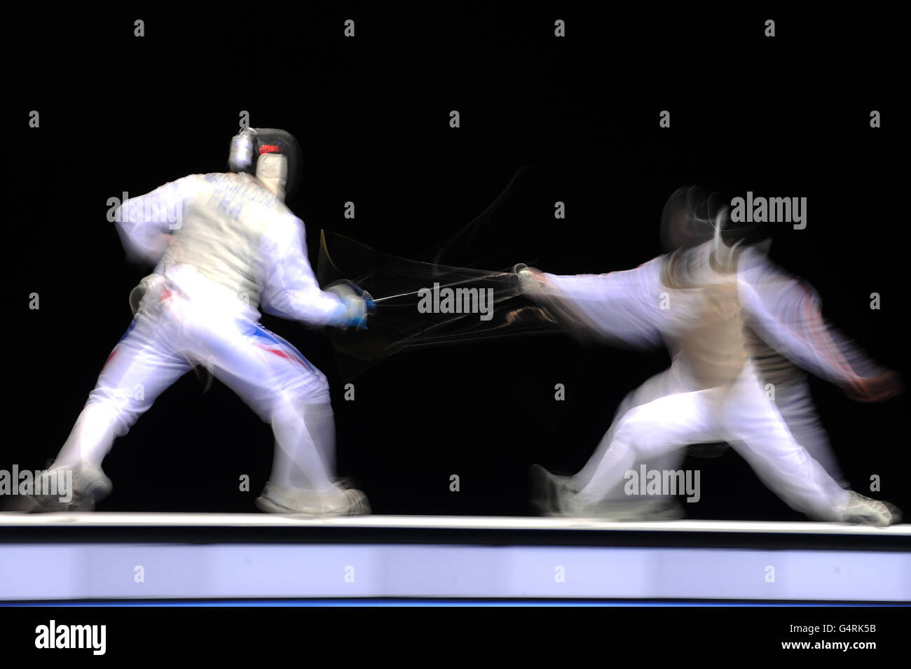 Great Britain's Keith Cook (right) in action against France's Marcel ...