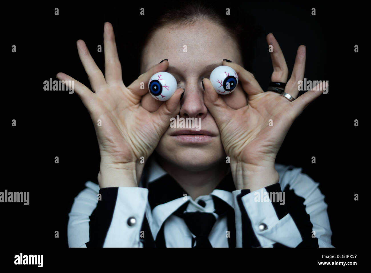 Woman with artificial eyes Stock Photo - Alamy