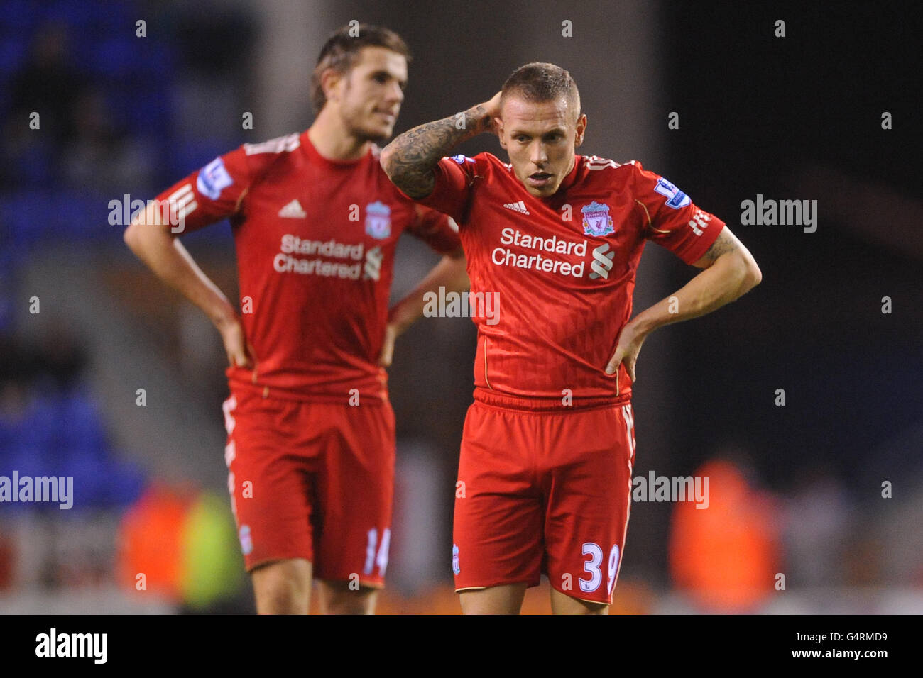 Liverpools jordan henderson left and craig bellamy stand dejected hi ...