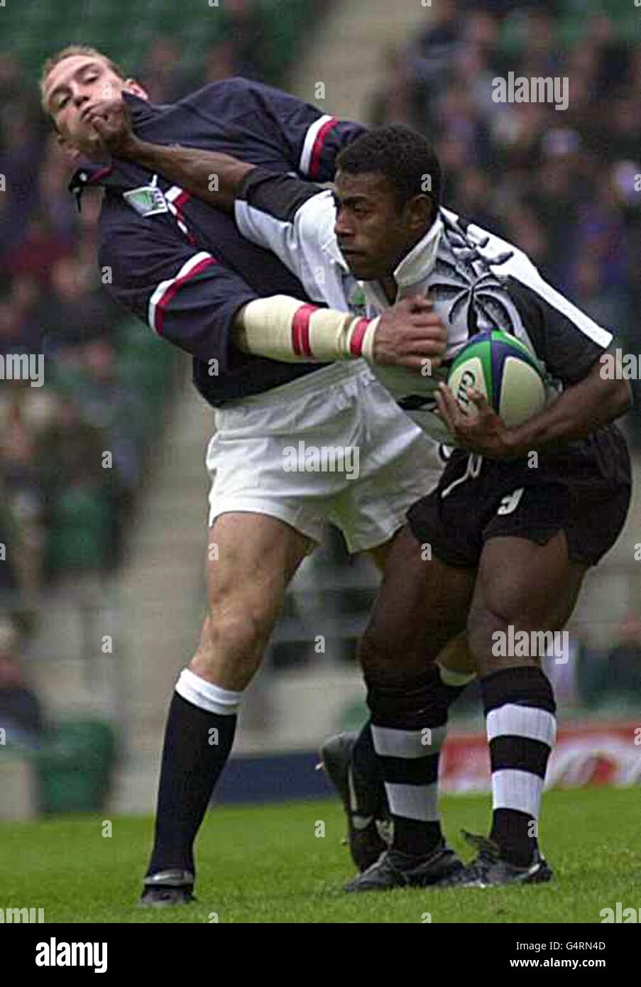 Action tackle hand off hi-res stock photography and images - Alamy