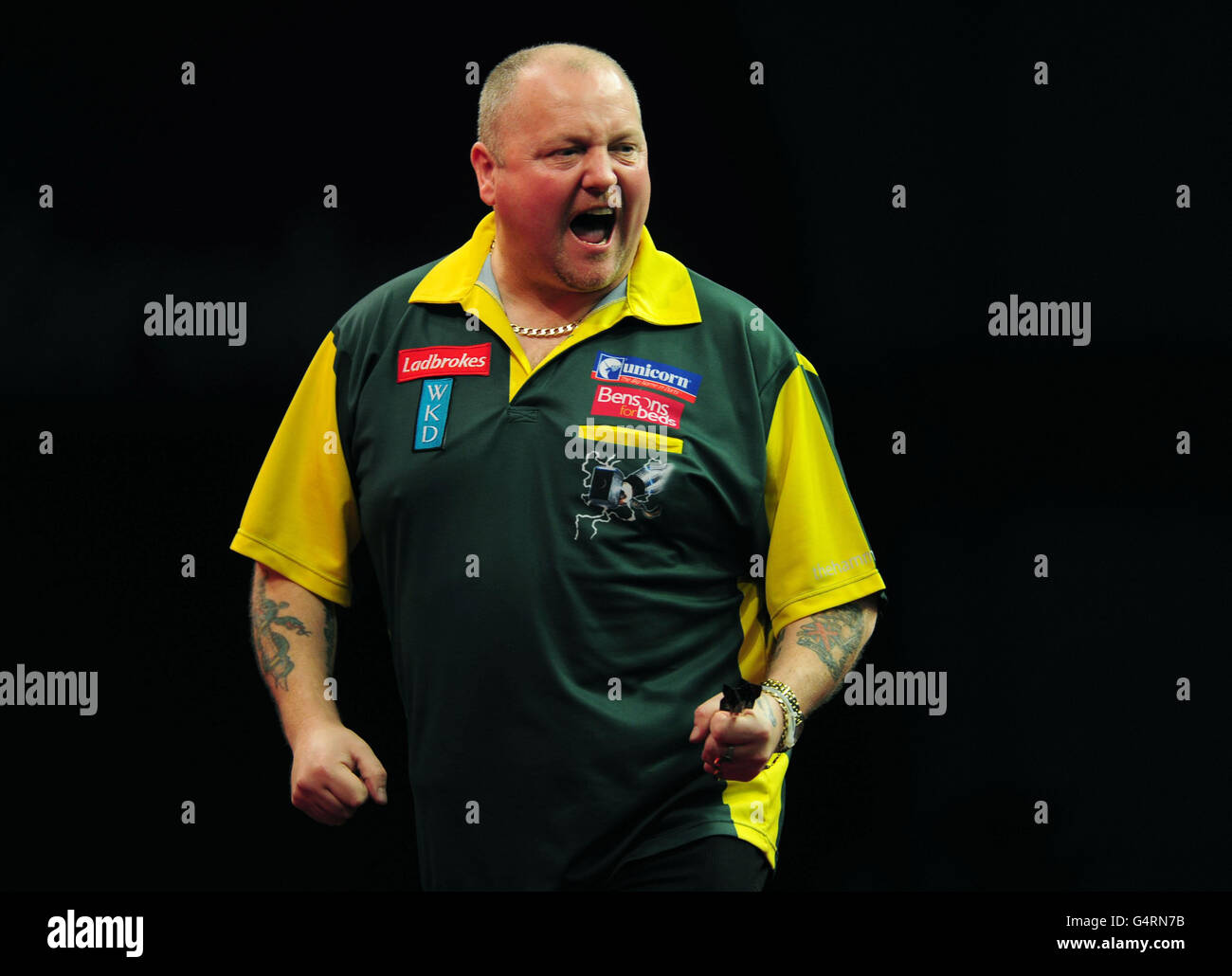 Andy Hamilton celebrates taking the first 2 sets against Belgium's Kim ...