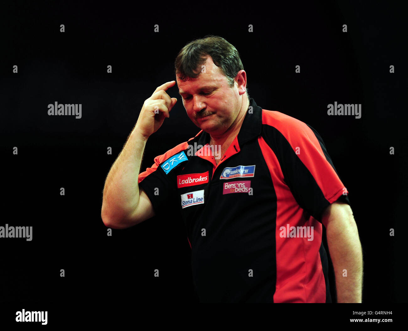 A dejected looking Terry Jenkins during his match against Adrian Lewis ...