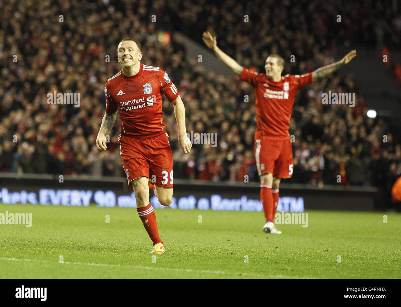 Liverpool's Craig Bellamy (left) celebrates scoring their second goal ...