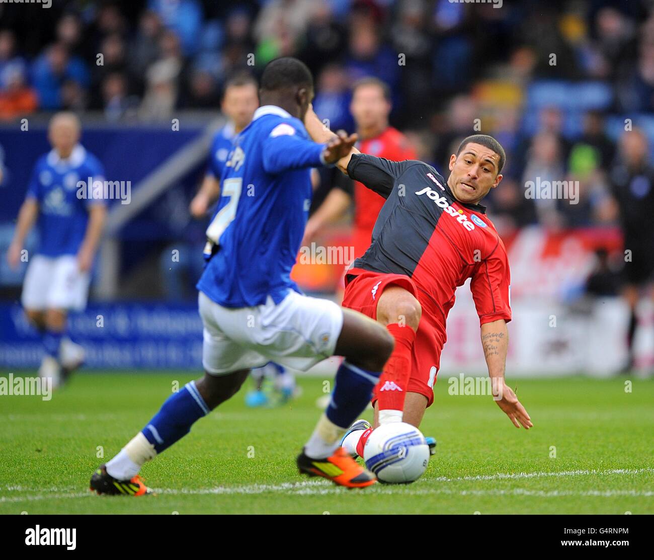 Portsmouth's Hayden Mullins (right) and Leicester City's Jeffery ...