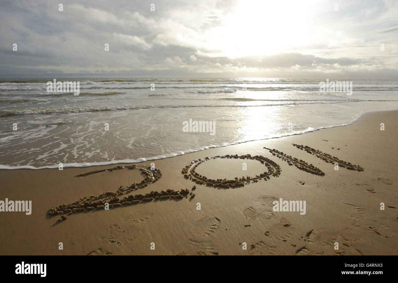 A 2011 sign written in the sand on the beach at Bournemouth, Dorset ...