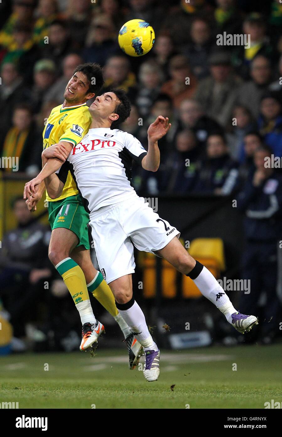 Fulham's Stephen Kelly (right) and Norwich City's Andrew Surman (left ...