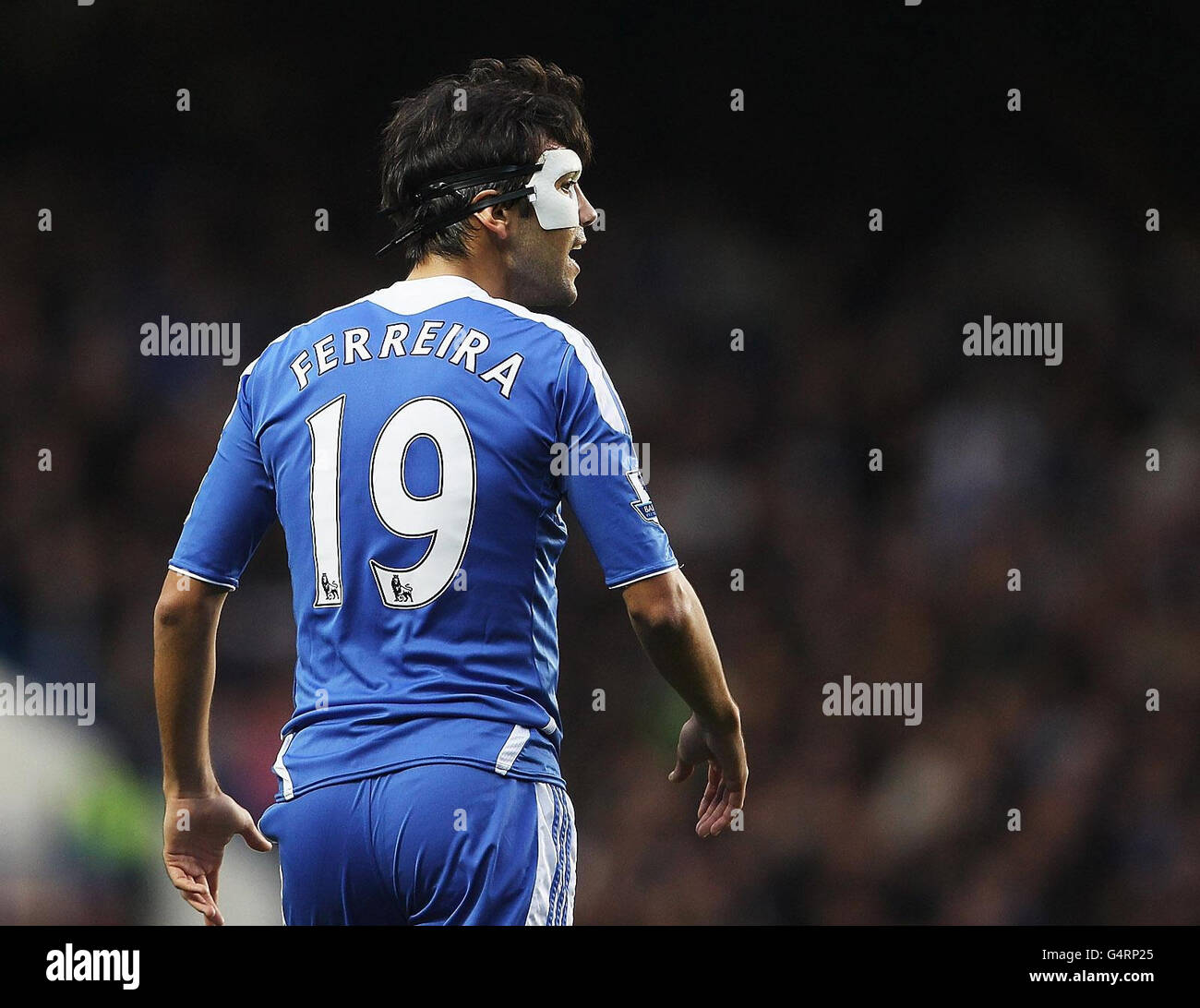 Chelsea's Paulo Ferreira wears a protective mask during the Barclays ...