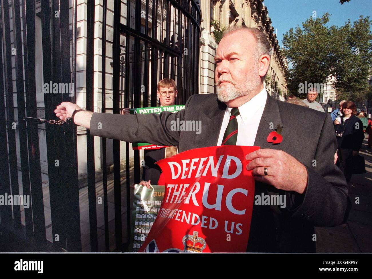 Royal Ulster Constabulary (RUC) supporter William Montgomery handcuffed ...