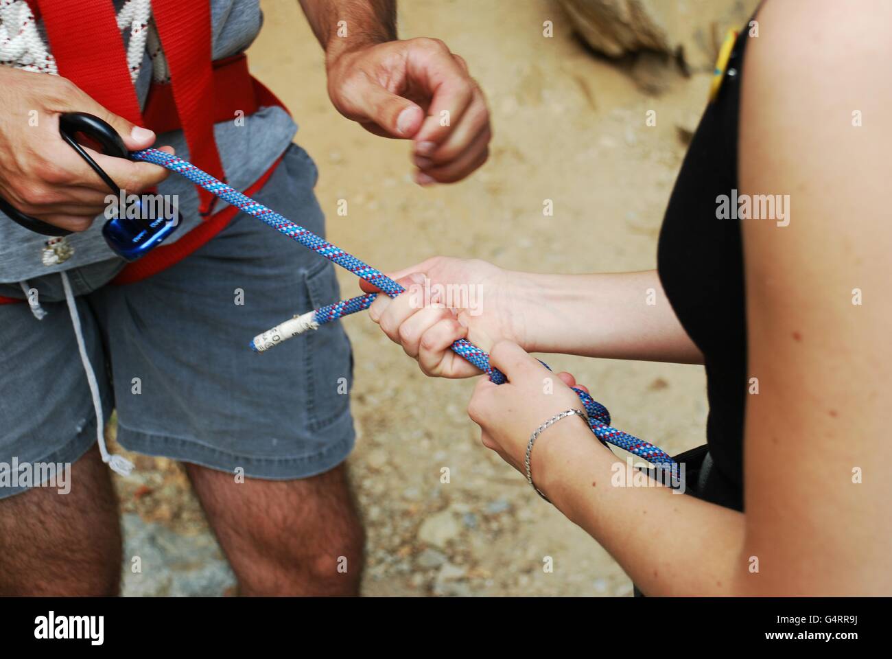 Rock climbers testing their equipment Stock Photo - Alamy