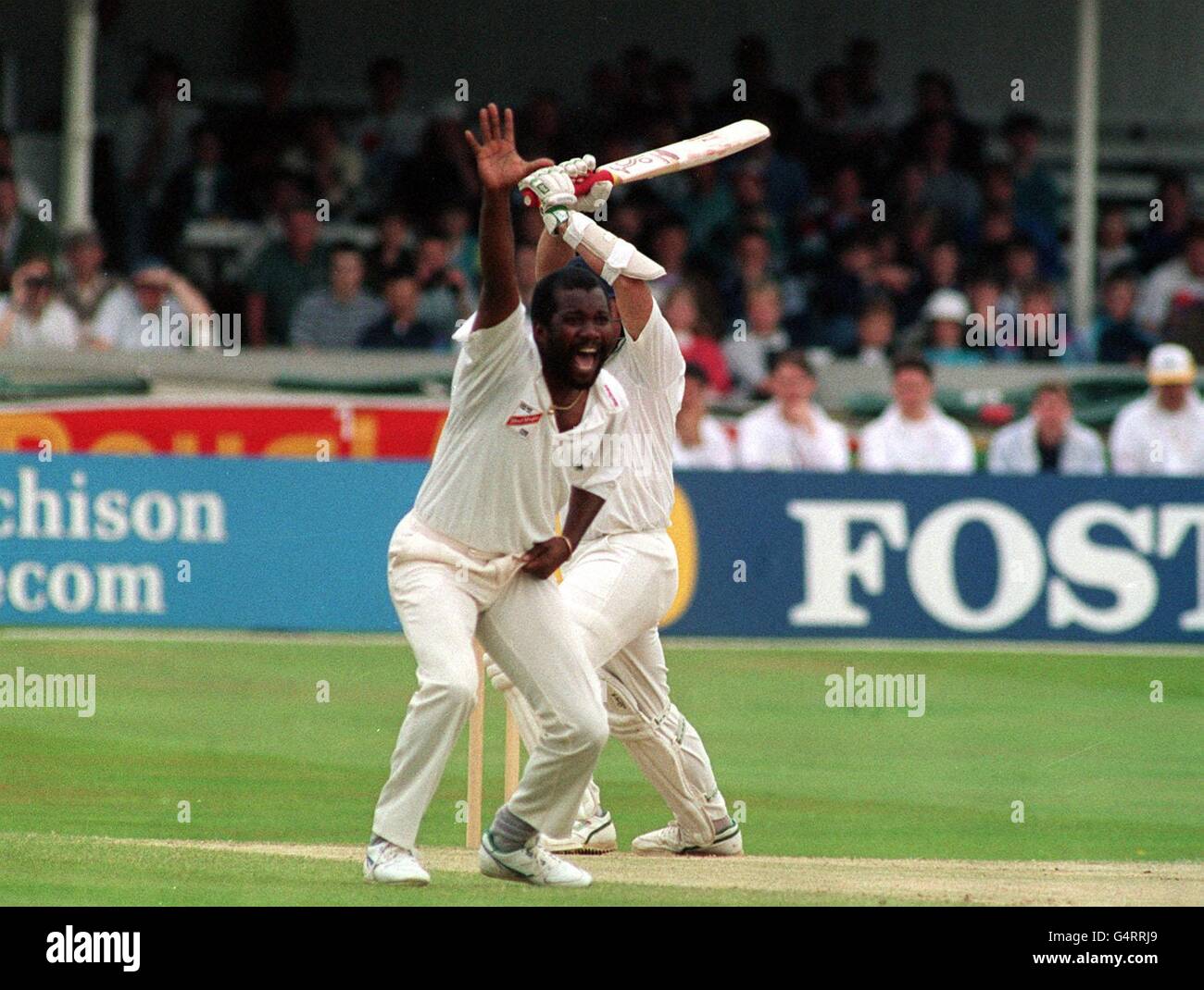 West Indian bowler Malcom Marshall (foreground) celebrates the capture ...