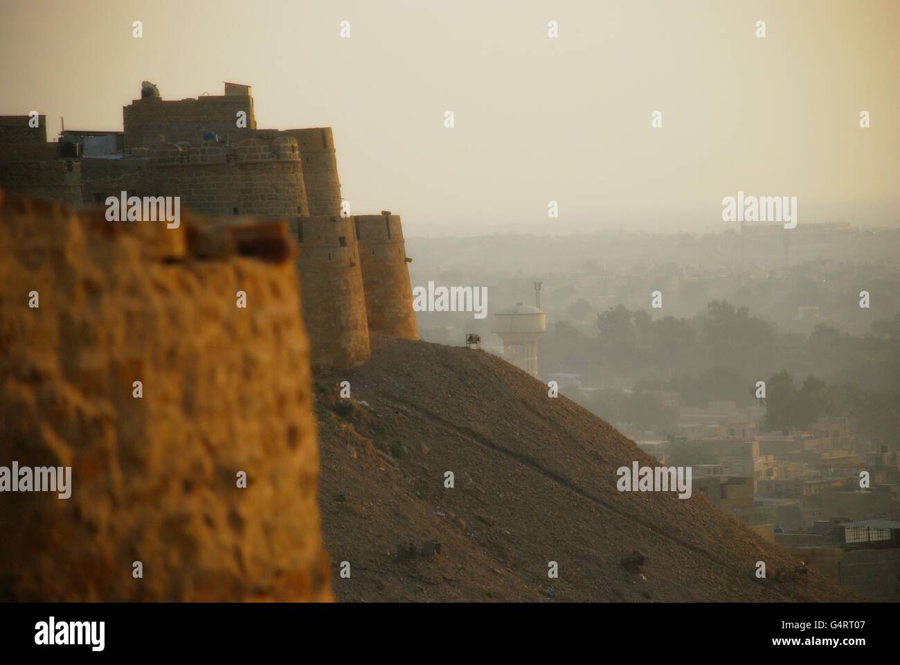 The magnificient stone walls of the fortress of Jaisalmer dominating ...
