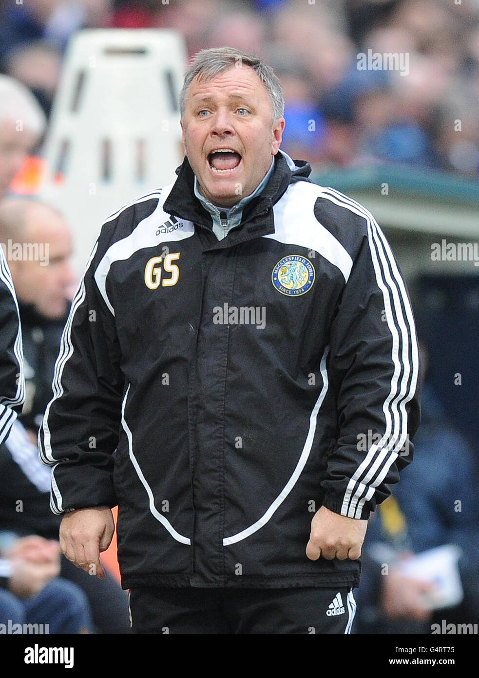Macclesfield Town's Manager Gary Simpson shouts his orders from the ...