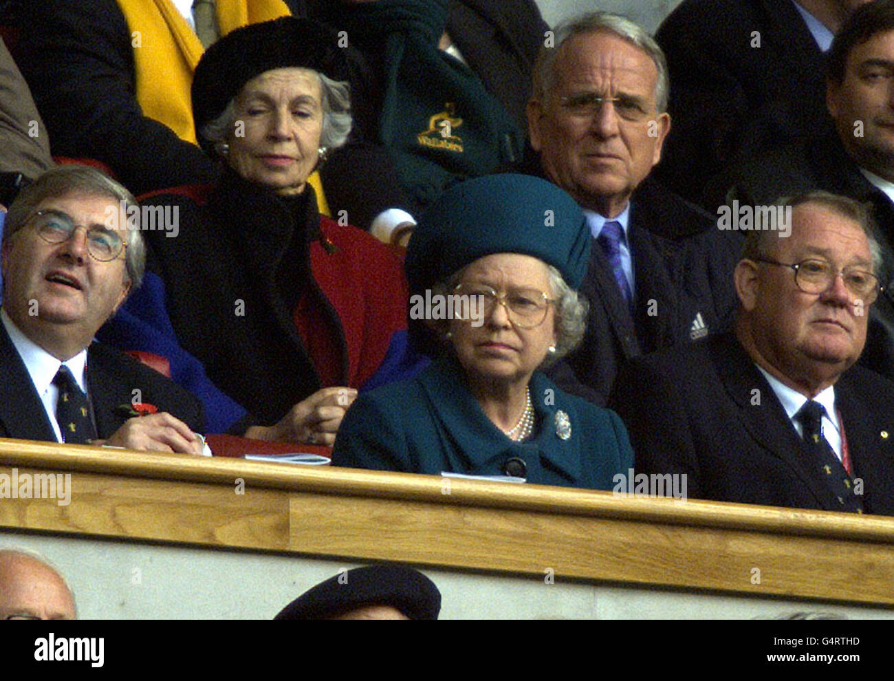 The Queen (front row, centre) watches the Rugby World Cup Final between ...