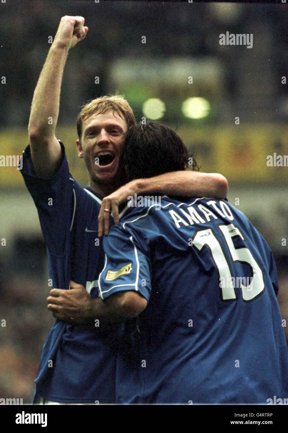 Rangers Craig Moore celebrates with Gabriel Amato after Amato's goal ...