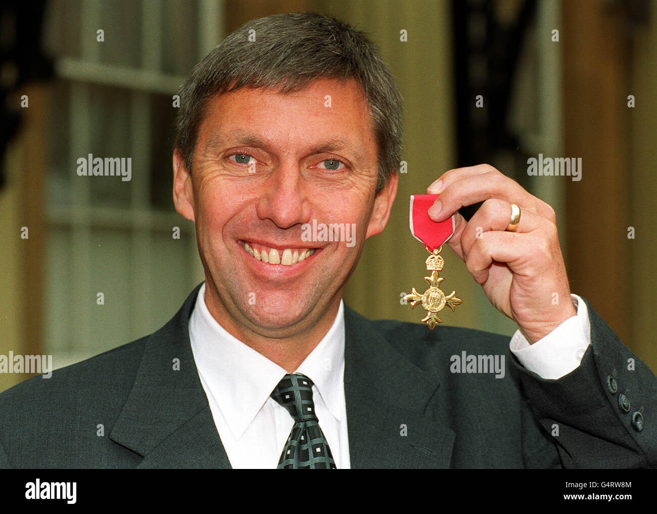 David Moorcroft, Chief Executive of UK Athletics, at Buckingham Palace ...