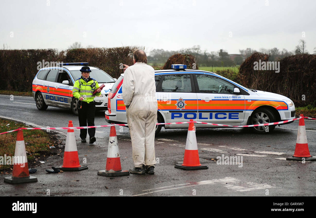 Police close a road leading to Leicester Airport, near Great Stretton ...