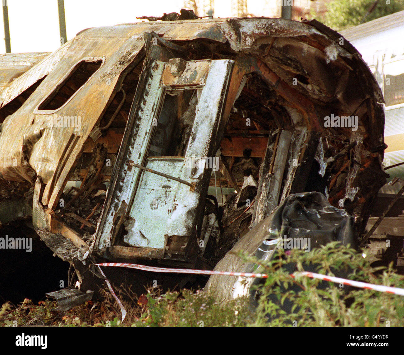 The crash wreckage site of the burnt out carriage where two trains ...