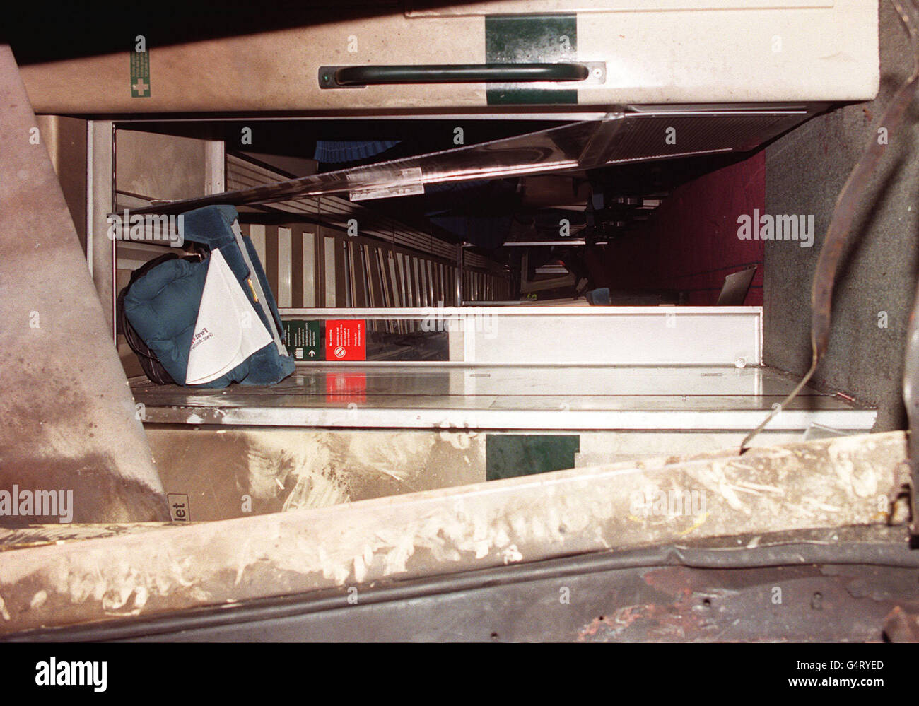 The interior of a crash wrecked train carriage viewed on it's side, as ...