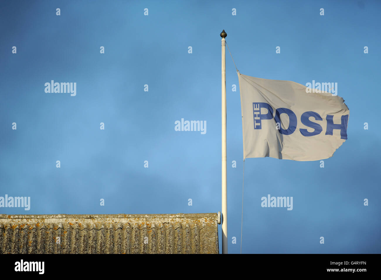 A general view of a flag flying above the ground at London Road, home ...