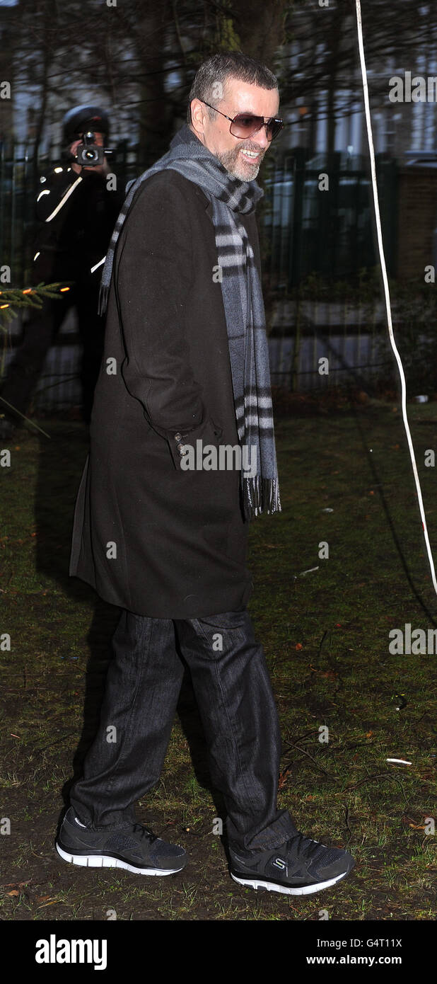 George Michael makes a statement to the media outside his home in ...