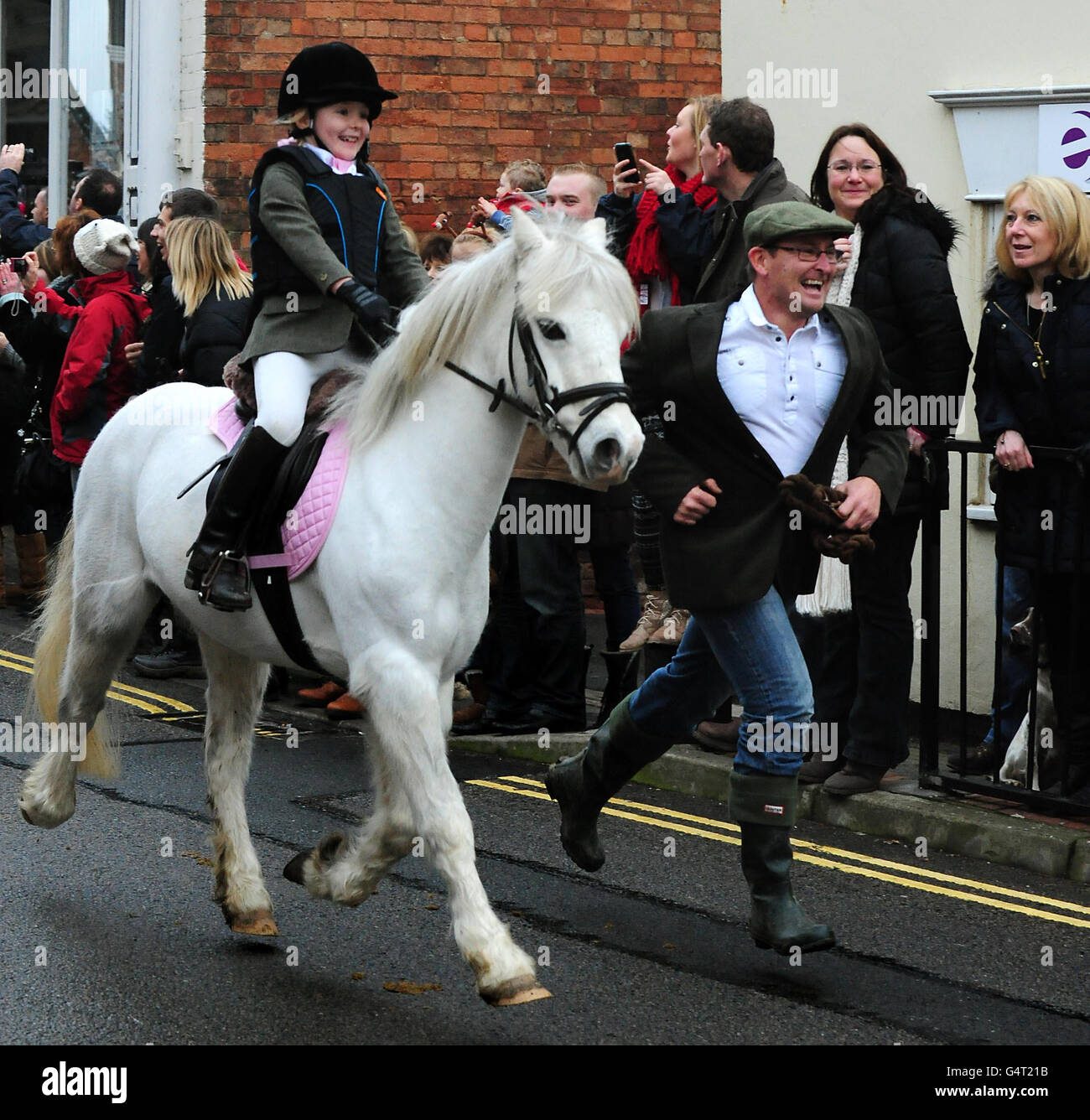 A young riders from the Atherstone Hunt rides through Main Street in ...