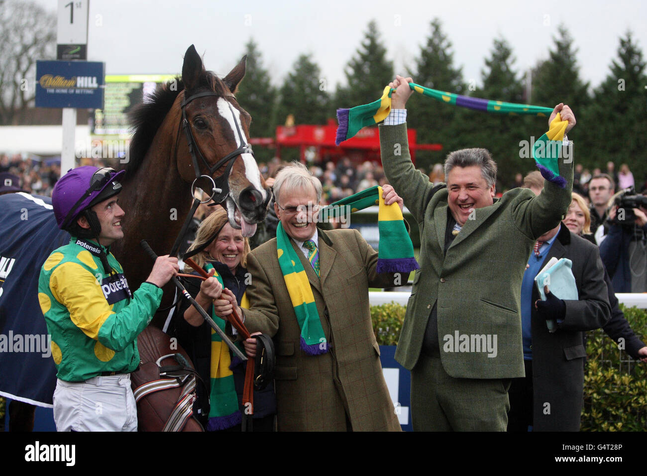 Jockey Ruby Walsh with owner Clive Smith (centre right) and trainer ...