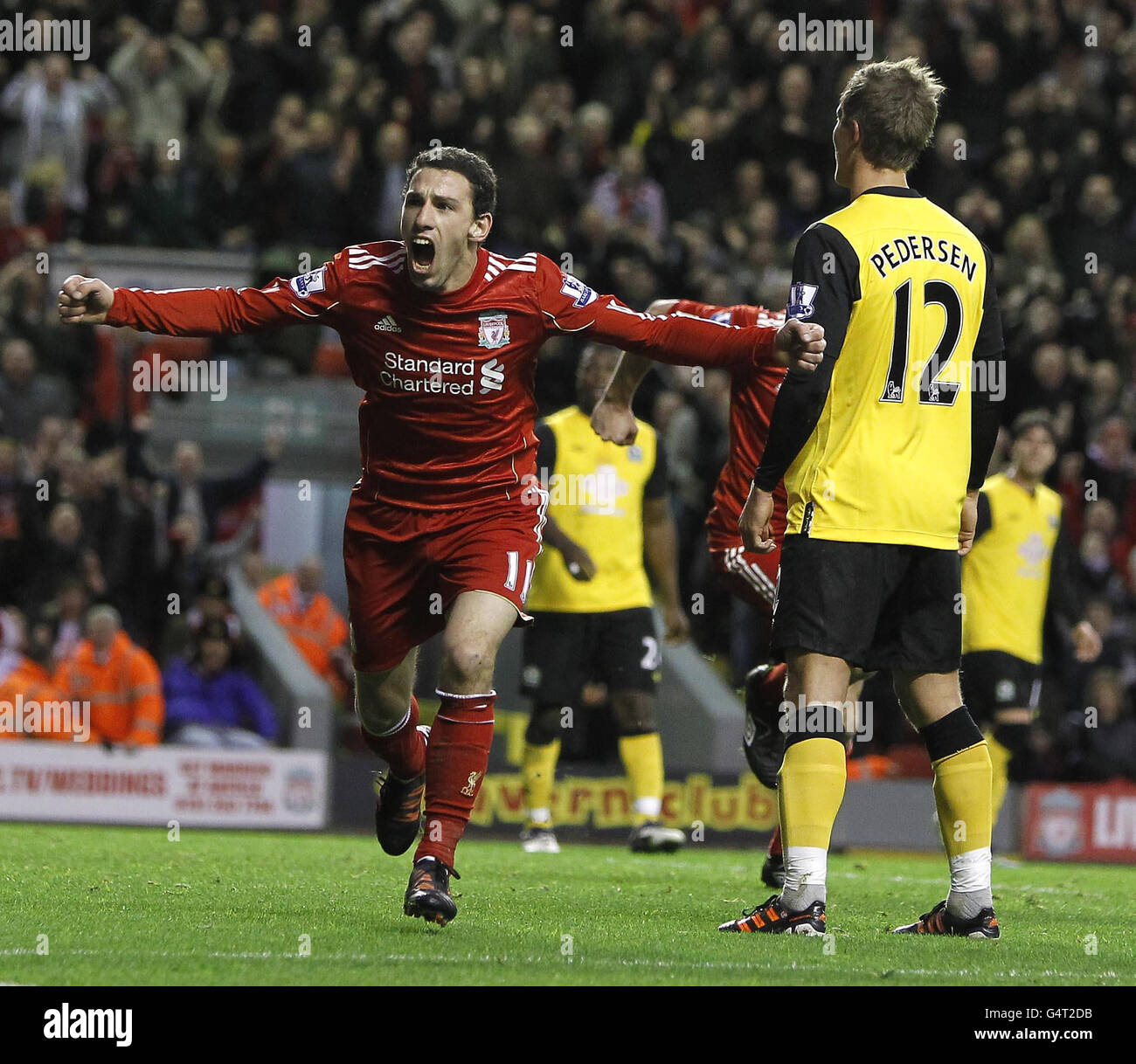 Liverpool's Maxi Rodriguez celebrates scoring the equaliser during the ...
